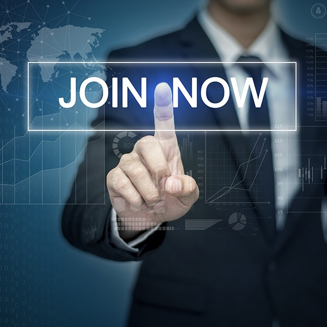 Businessman hand touching JOIN NOW button on virtual screen – Agora Plus